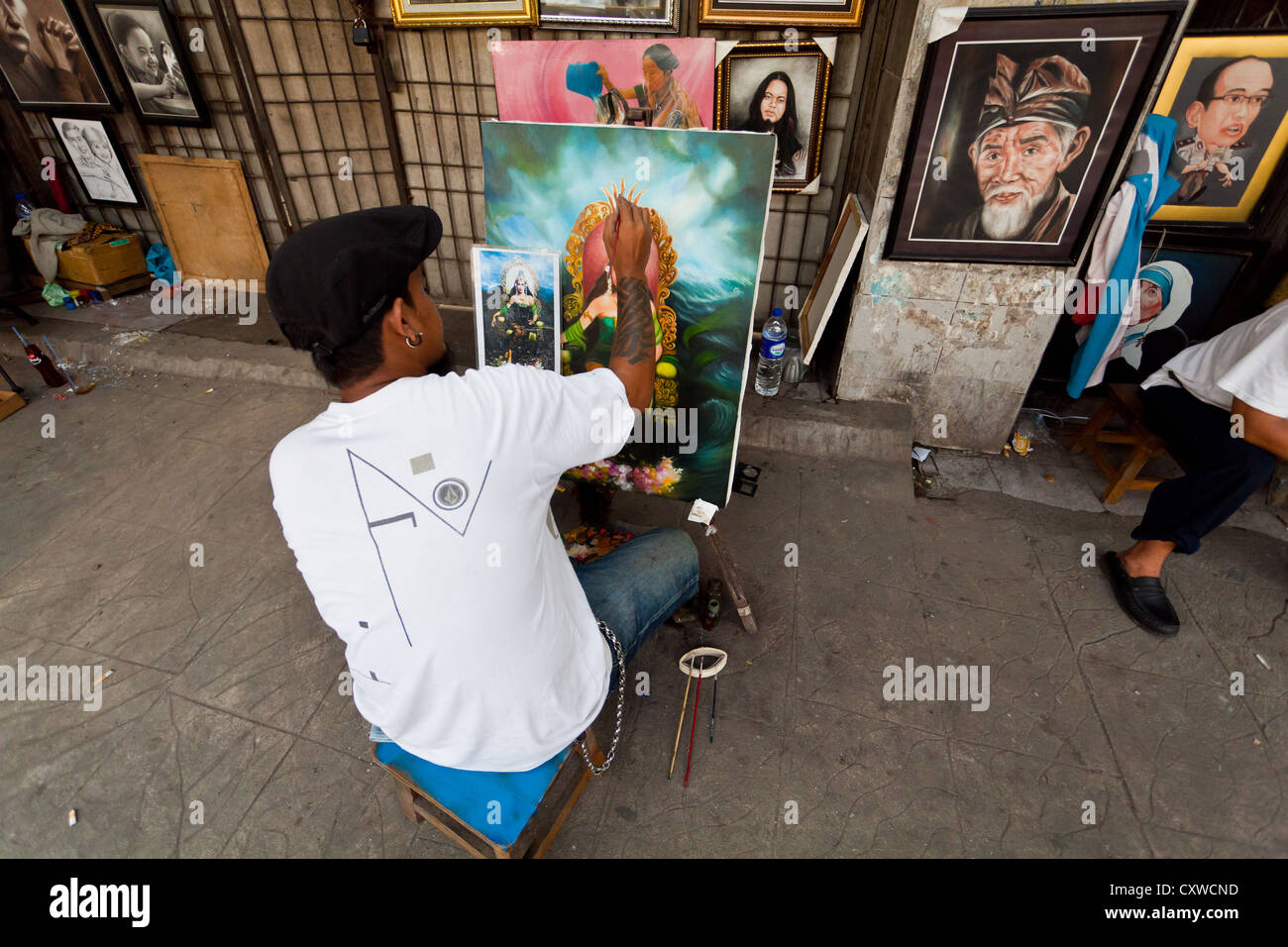 Portrait Artist in the Streets of Jakarta, Indonesia Stock Photo - Alamy