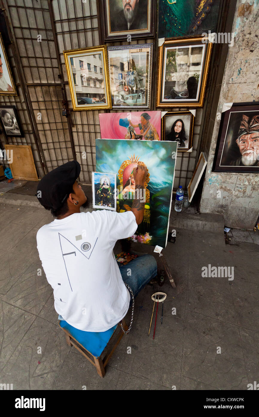 Portrait Artist in the Streets of Jakarta, Indonesia Stock Photo - Alamy