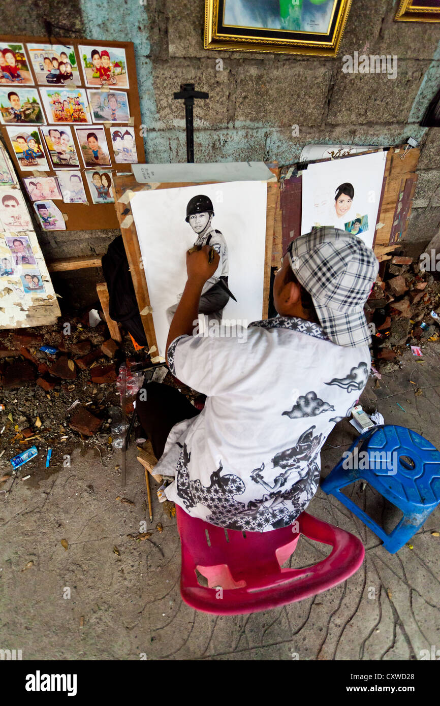 Portrait Artist in the Streets of Jakarta, Indonesia Stock Photo - Alamy
