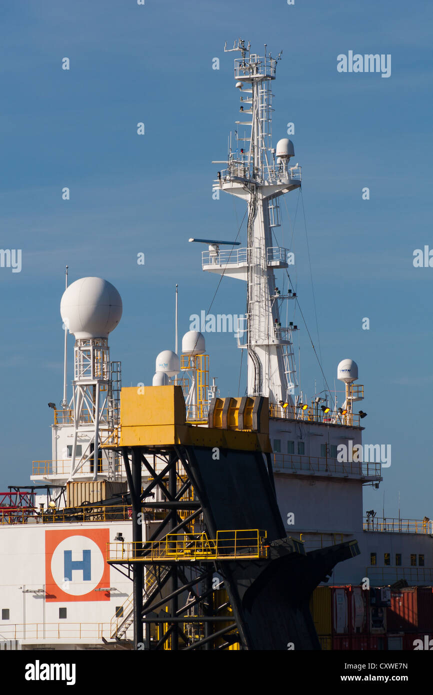 A close up of the bridge and mast of the heavy lift construction barge ...