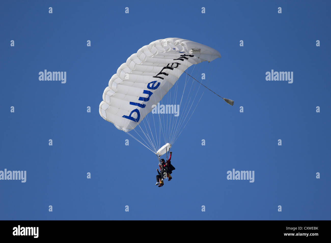 Bright colored parachutes Stock Photo - Alamy