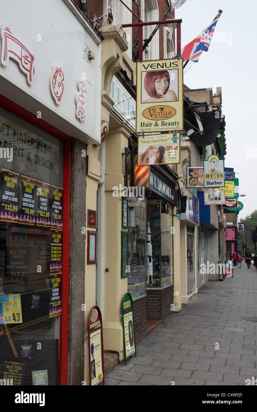 High street shop signs Stock Photo - Alamy