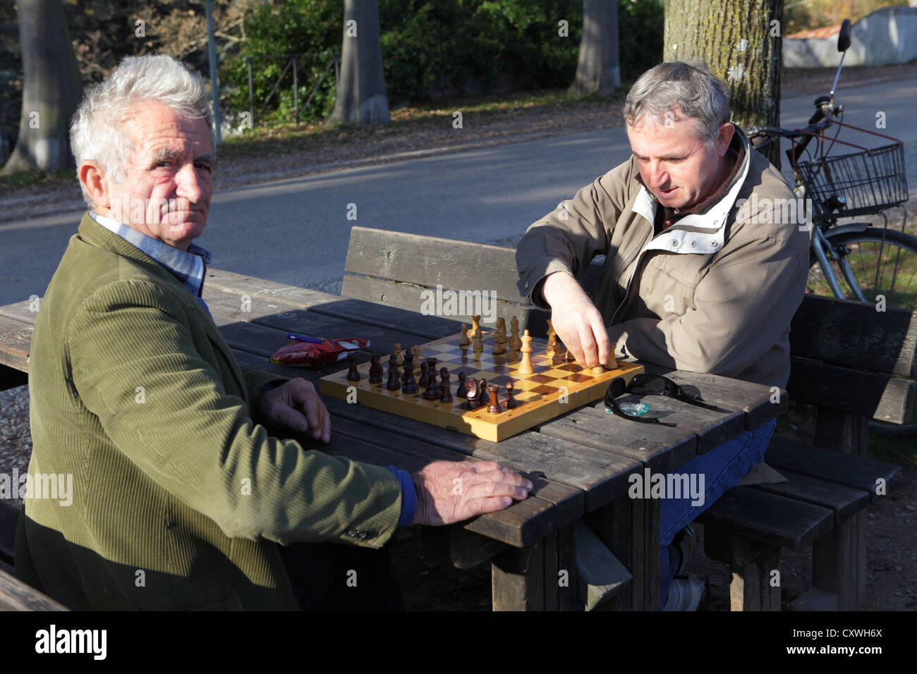 Two men playing chess Stock Photo - Alamy