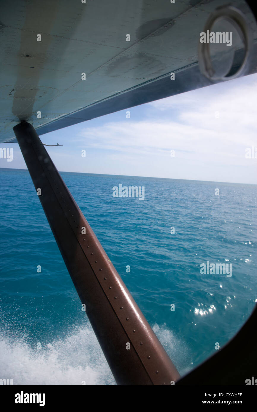 looking out of seaplane window taking off on water dry tortugas florida ...