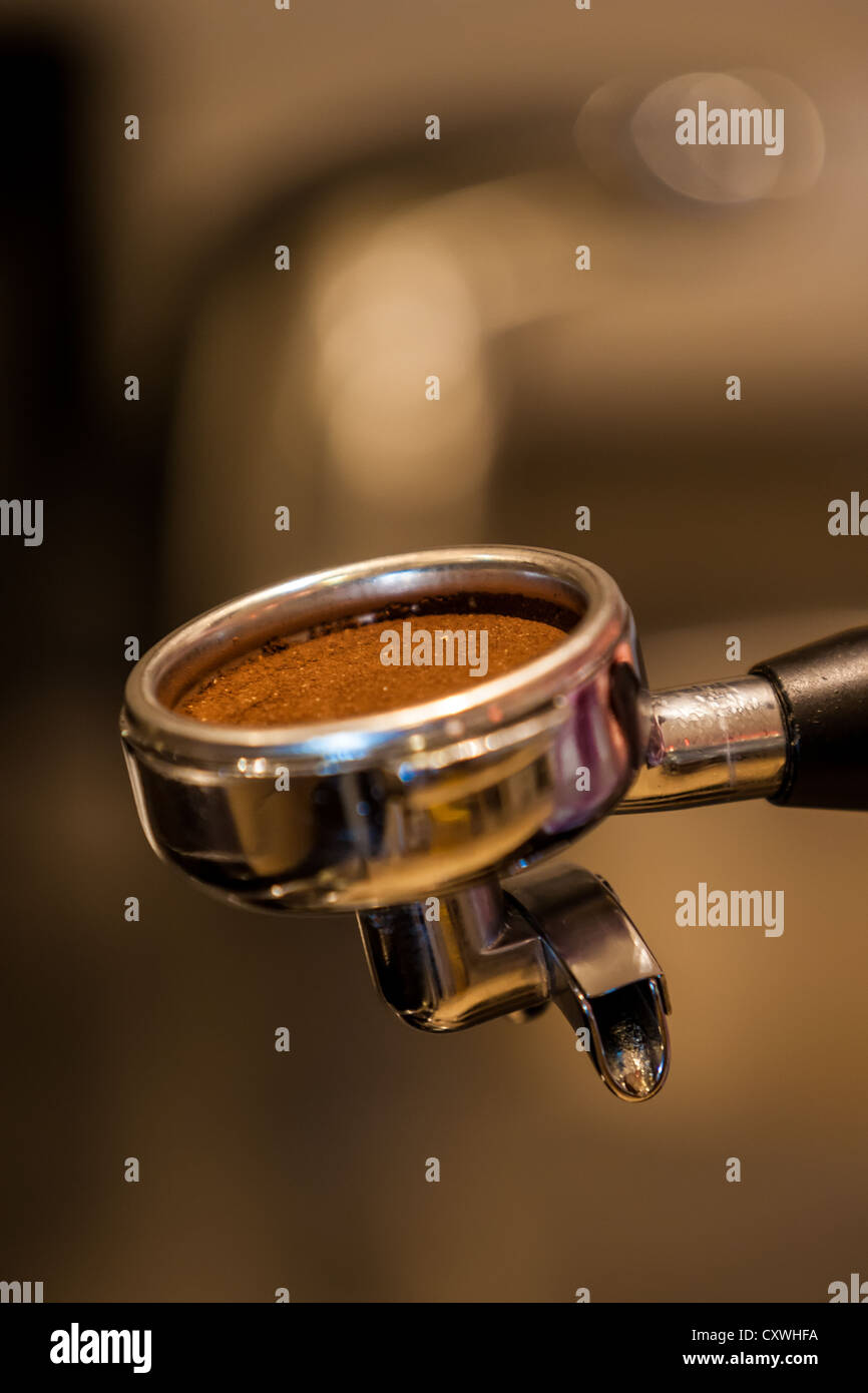 A barista filter holder for a coffe machine Stock Photo - Alamy