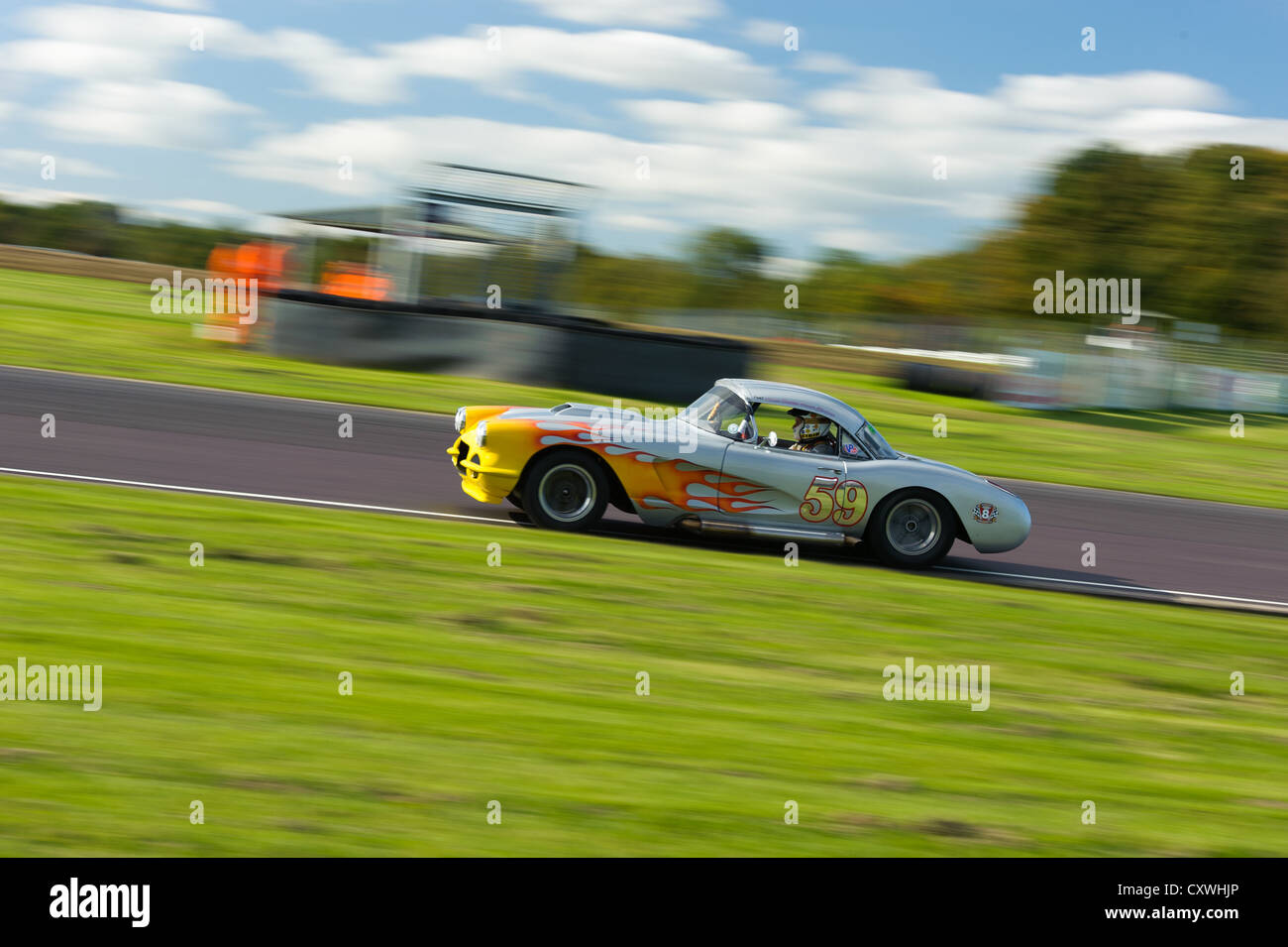 Classic cars racing around Castle Combe circuit Stock Photo - Alamy