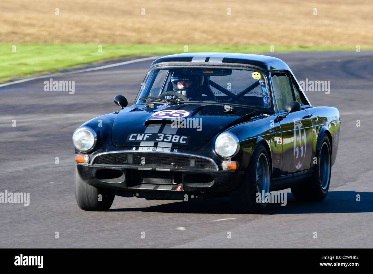 Classic cars racing around Castle Combe circuit Stock Photo - Alamy