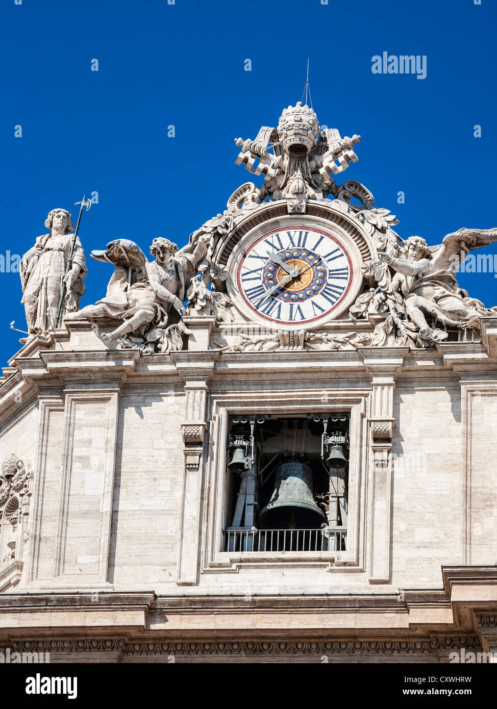 Close up of one of two clocks atop of Saint Peter's Basilica facade ...