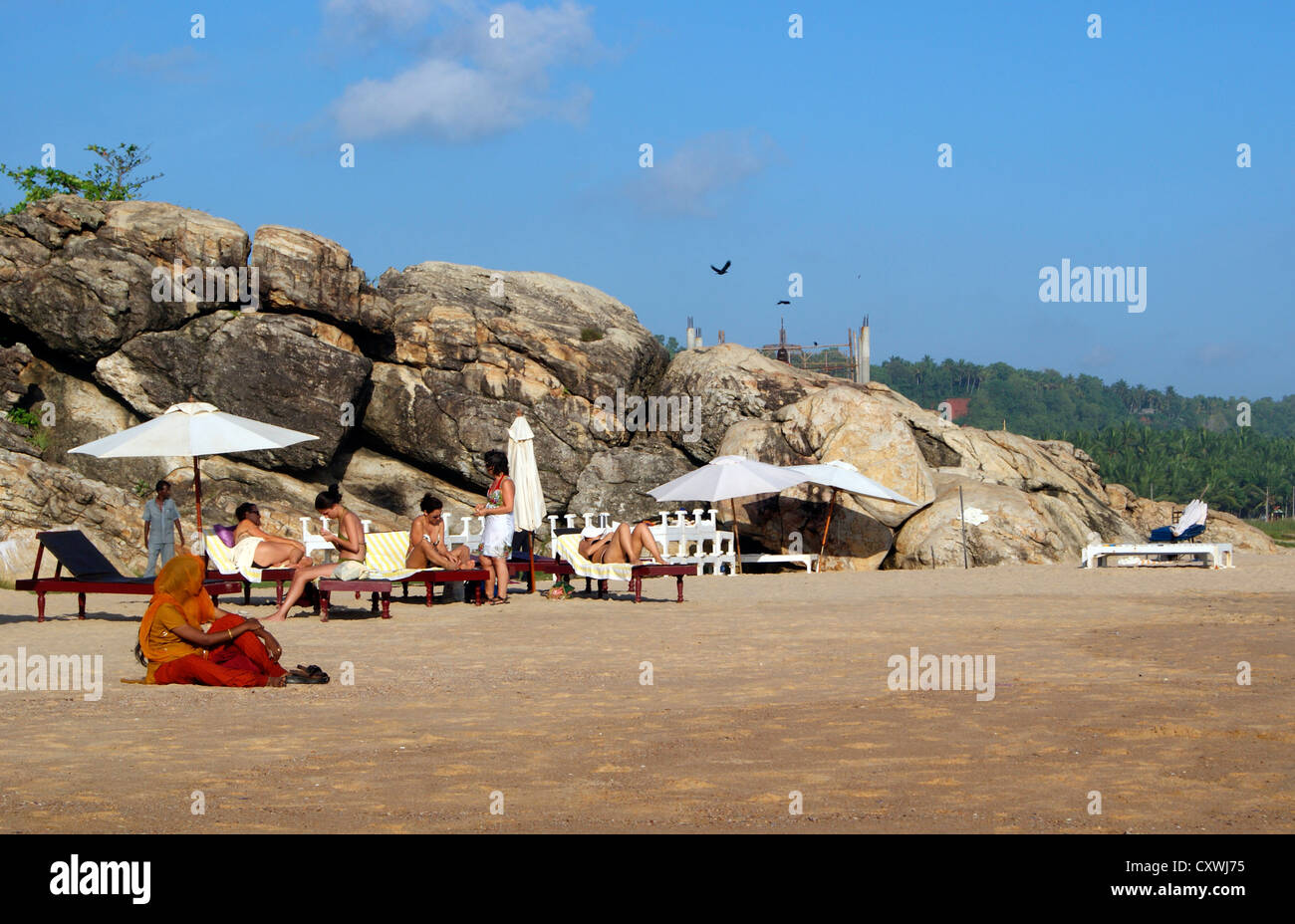 Foreigners sunbath scene hi-res stock photography and images - Alamy