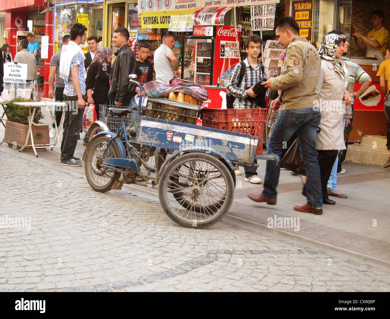 Turkish street scene with tricycle truck Stock Photo - Alamy