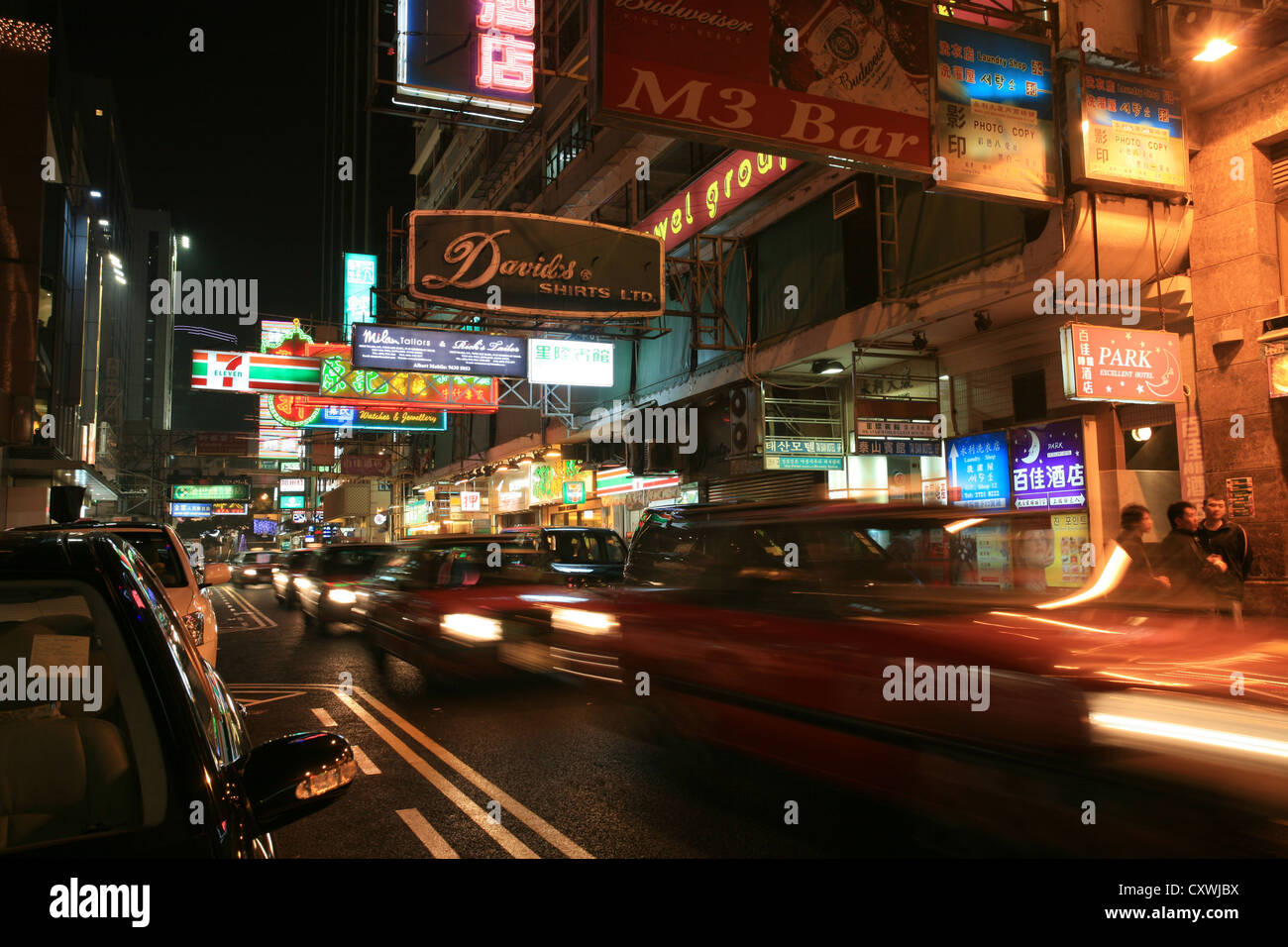 car through street in Hong Kong Stock Photo - Alamy
