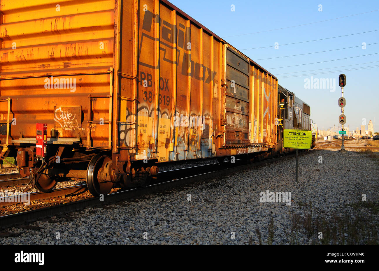A boxcar being pulled in a rail yard Stock Photo - Alamy