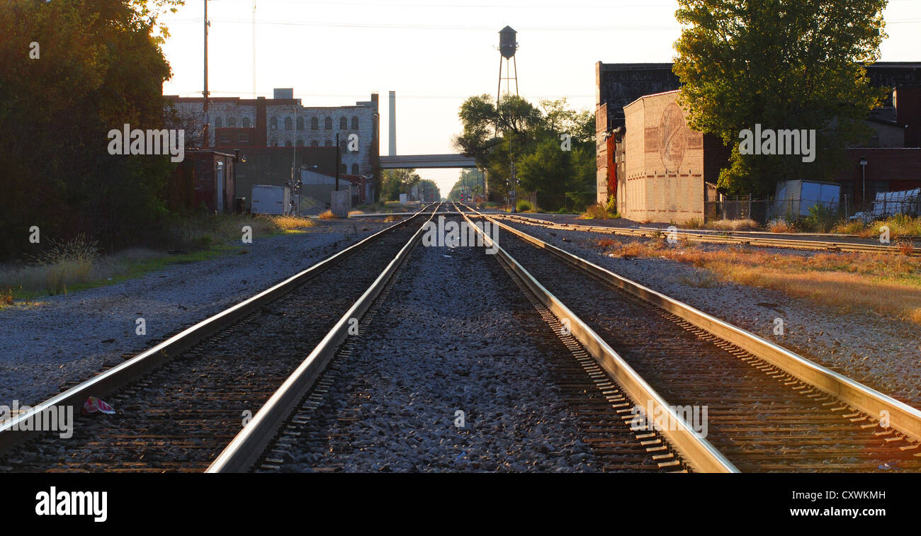 Train tracks in an industrial area Stock Photo - Alamy