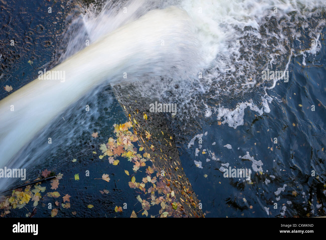 Water flowing out of the lock Stock Photo - Alamy