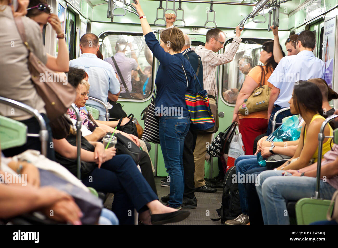 Commuters on train in Budapest Stock Photo - Alamy