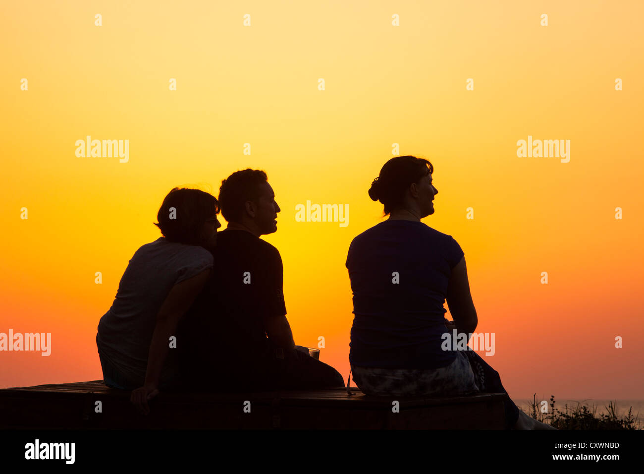 Group watching sunset hi-res stock photography and images - Alamy