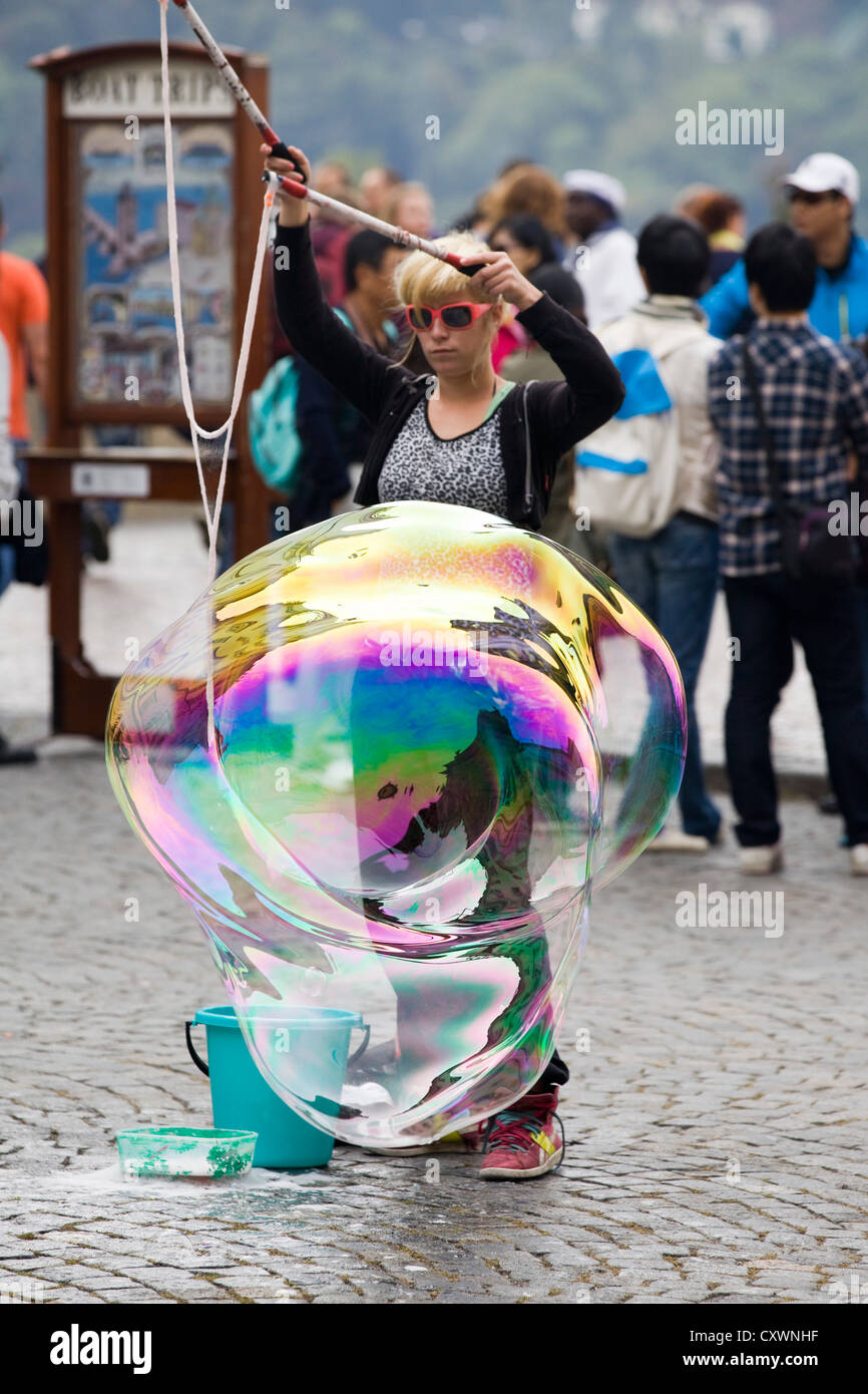 Girl making gigantic bubbles hi-res stock photography and images - Alamy