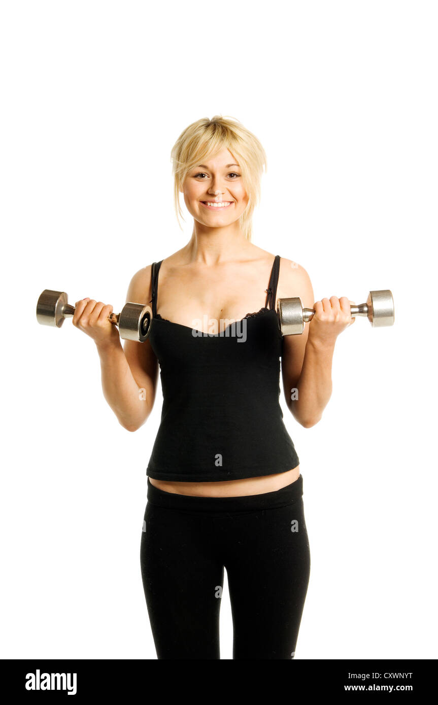 Pretty blonde woman lifting weights isolated on a white background ...