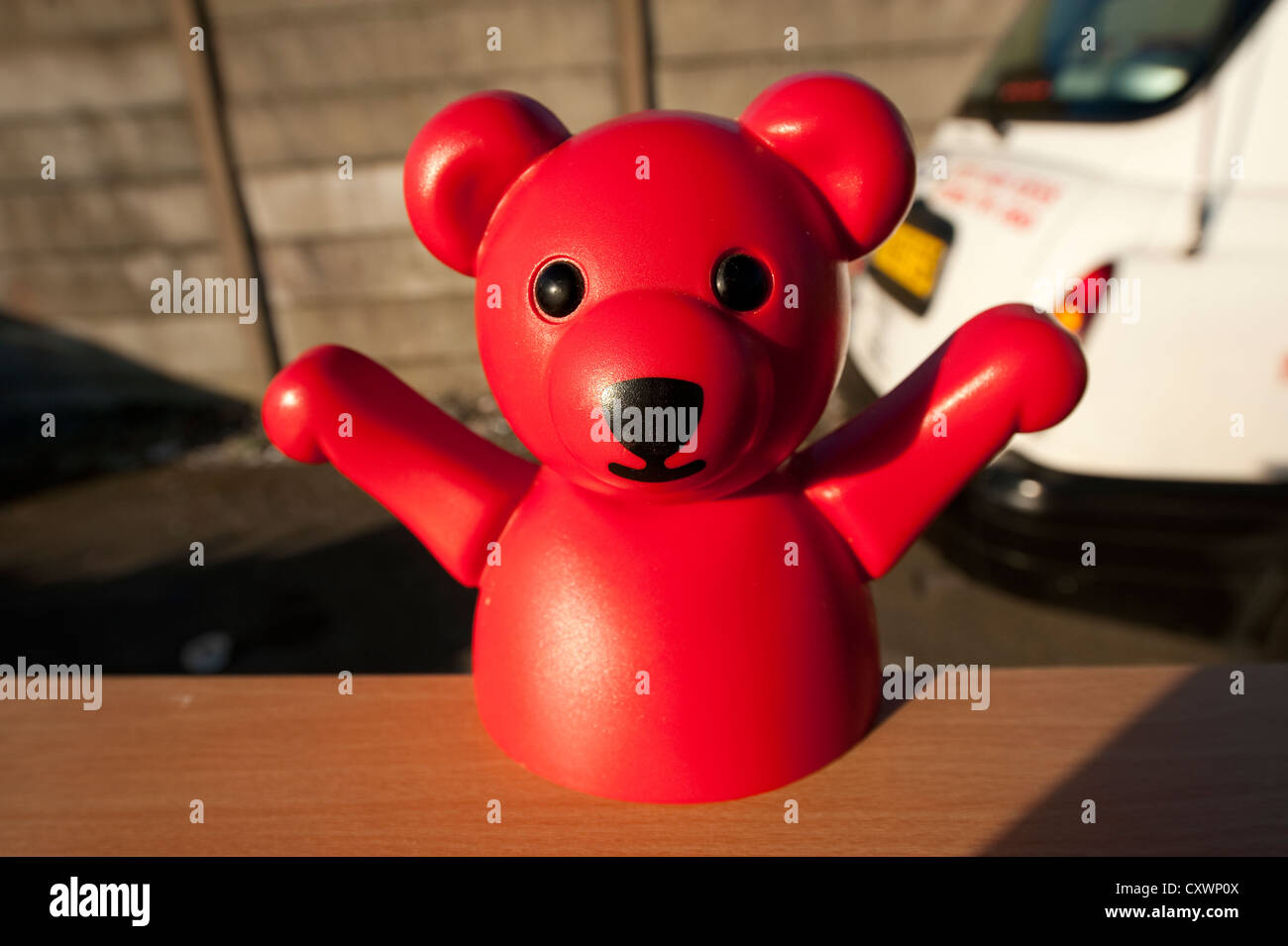 Bright happy red teddy arms open smiling Stock Photo - Alamy