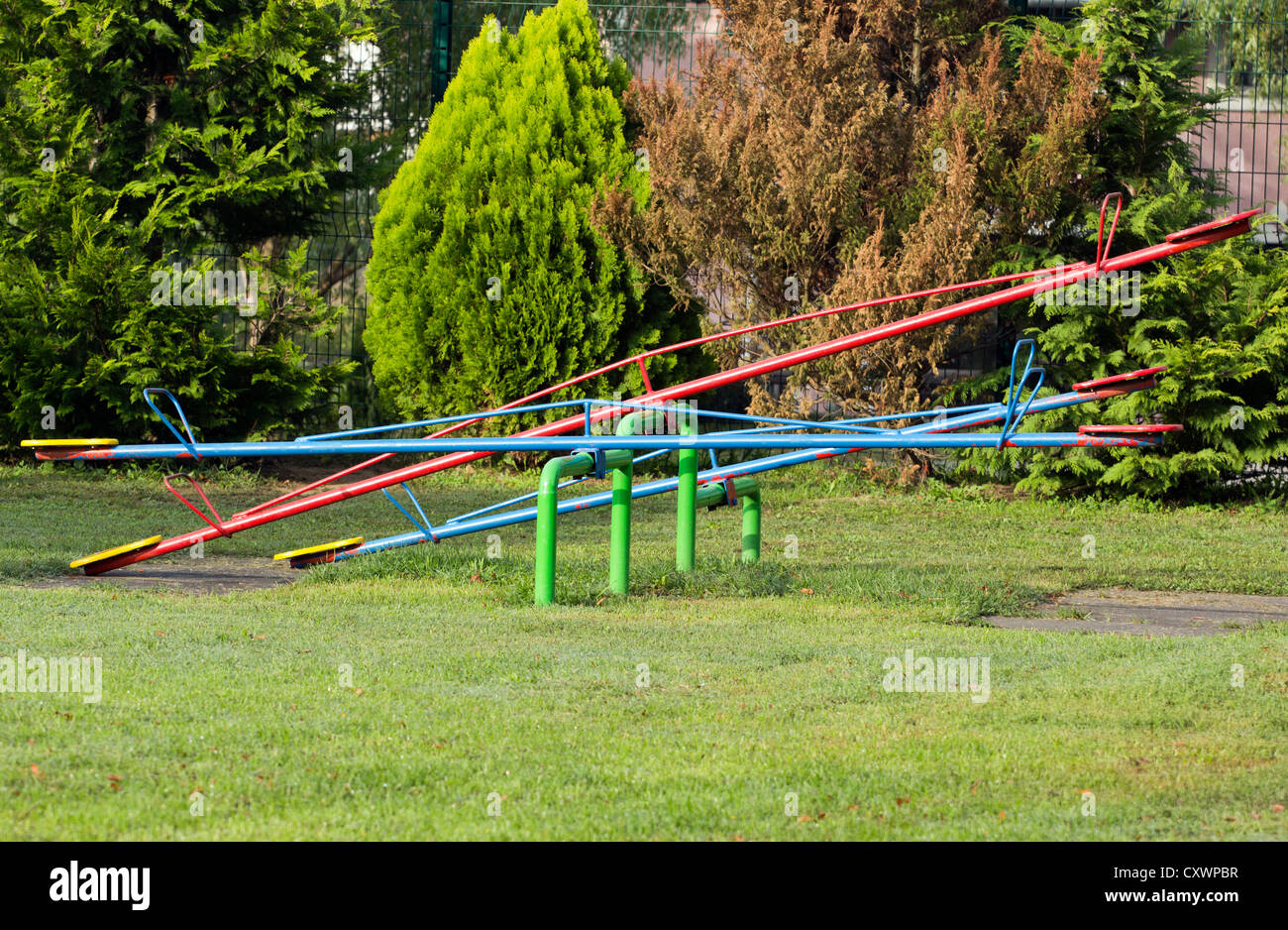 Seesaw on the childrens playground Stock Photo - Alamy