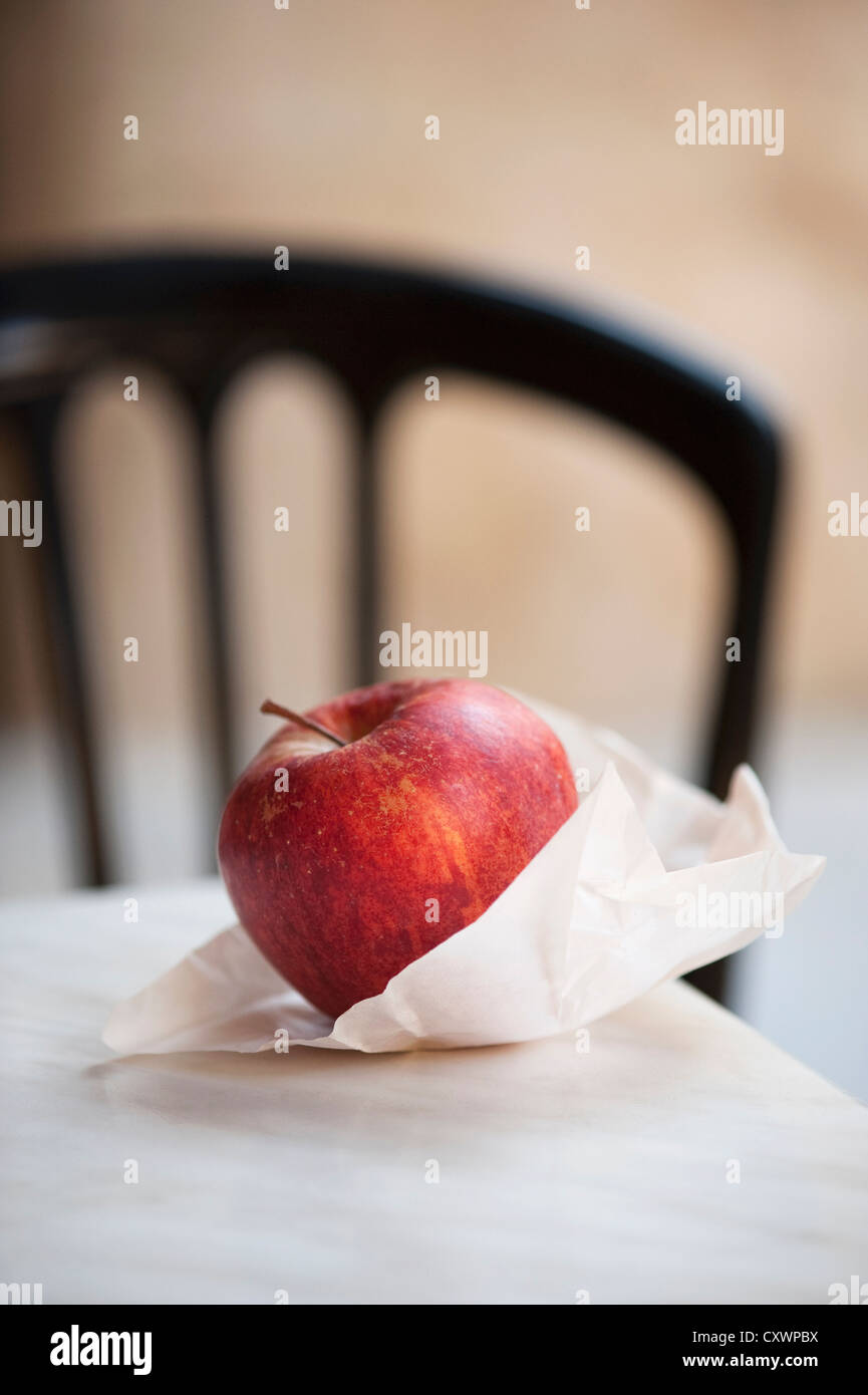 Close up of apple in paper bag Stock Photo - Alamy