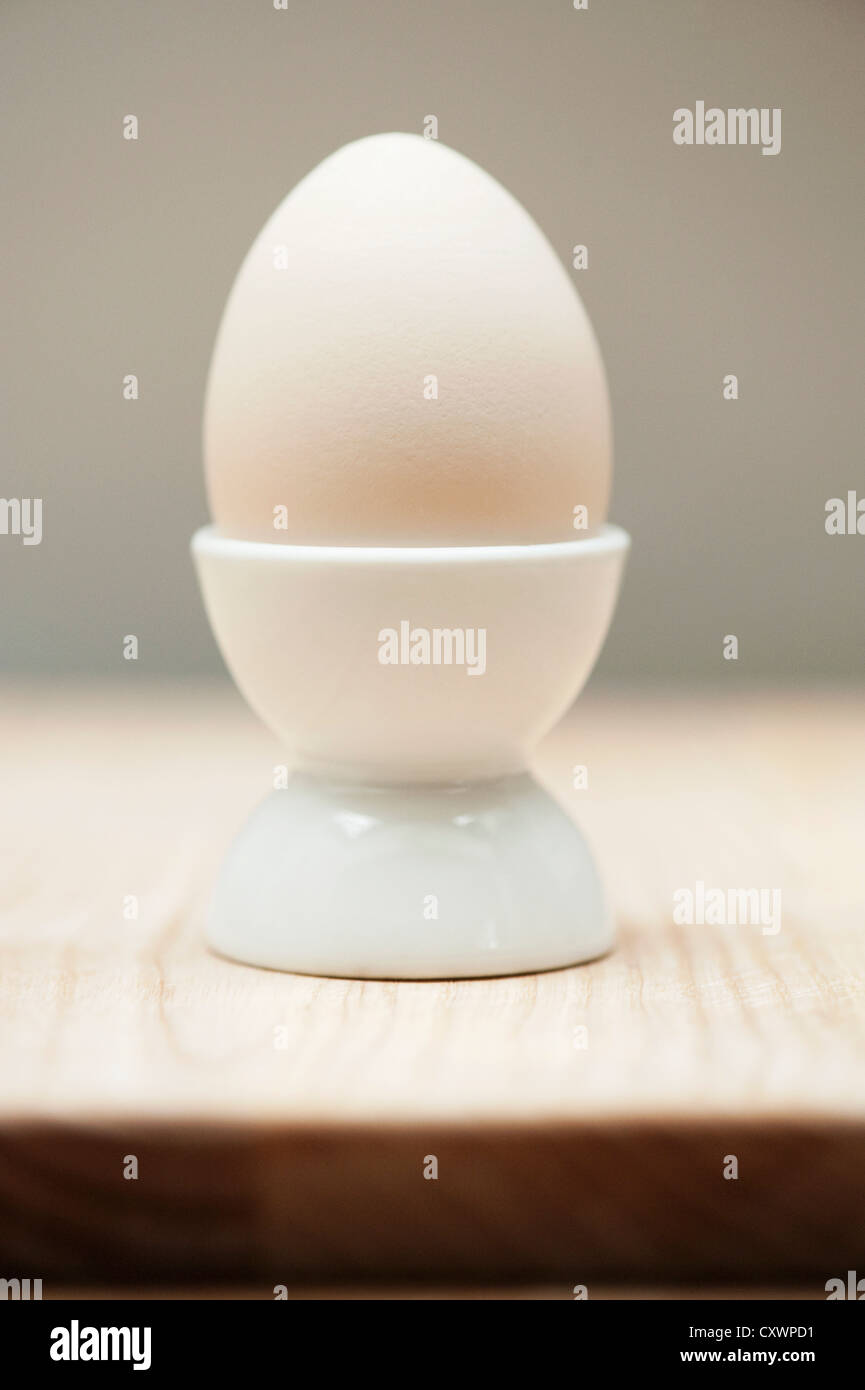 Close up of egg in egg cup Stock Photo - Alamy