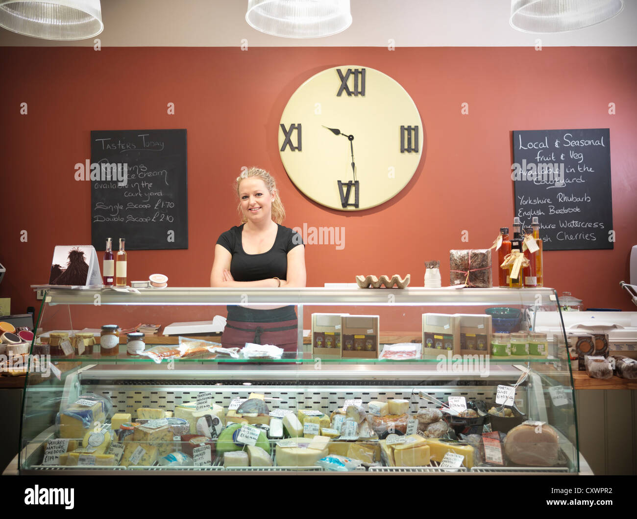Female grocer hi-res stock photography and images - Alamy