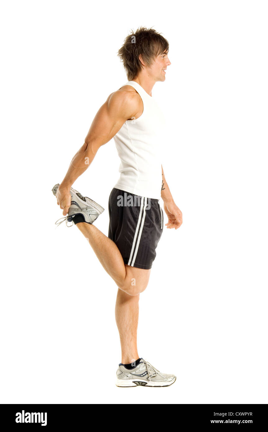 Muscular man doing stretching exercises isolated on a white background ...