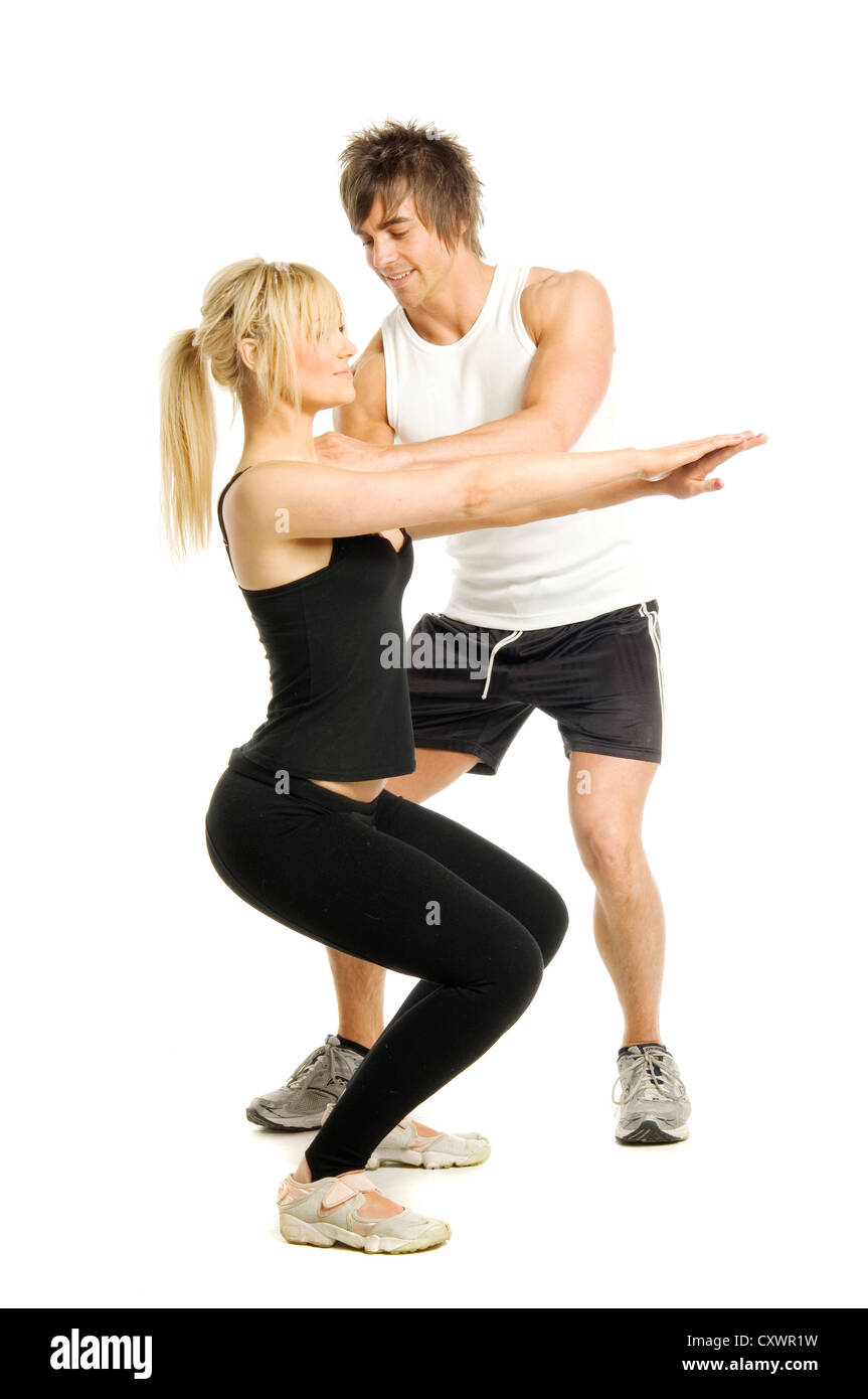 Male trainer instructing woman isolated on a white background Stock ...