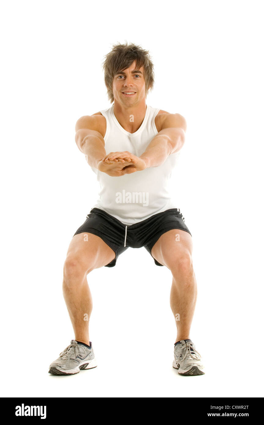 Muscular man doing exercises isolated on a white background Stock Photo ...