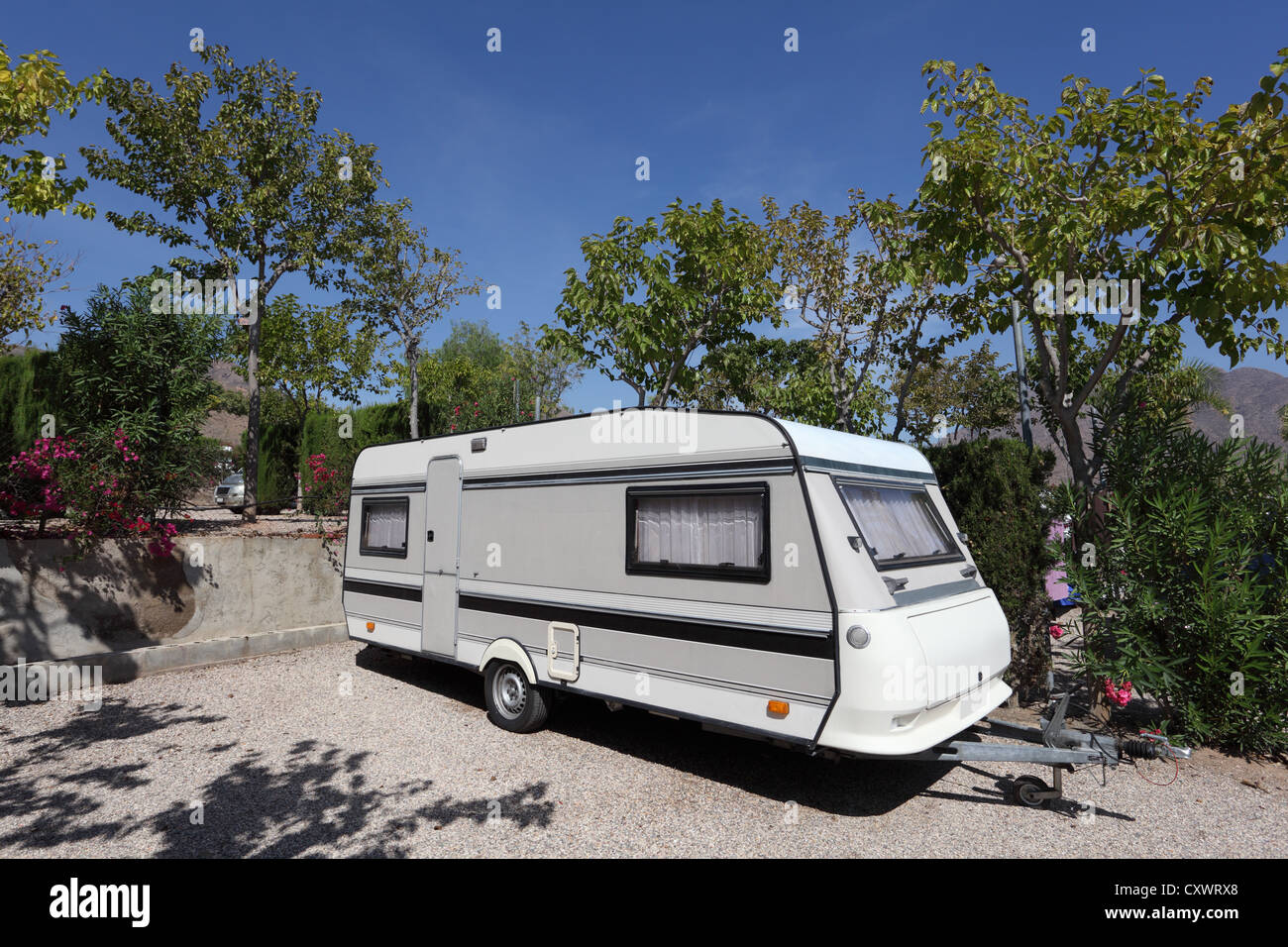 Caravan on a camping site Stock Photo - Alamy