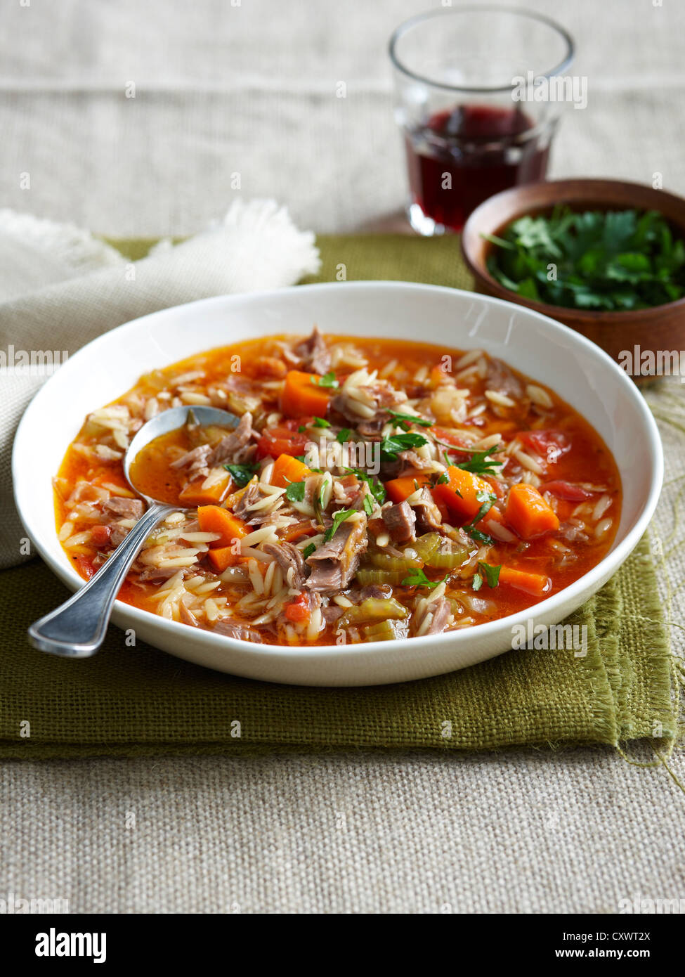 Bowl of lamb risoni soup Stock Photo - Alamy