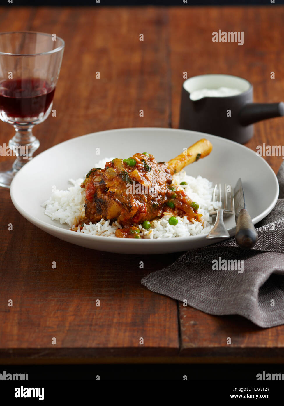 Plate of lamb, peas and rice Stock Photo - Alamy