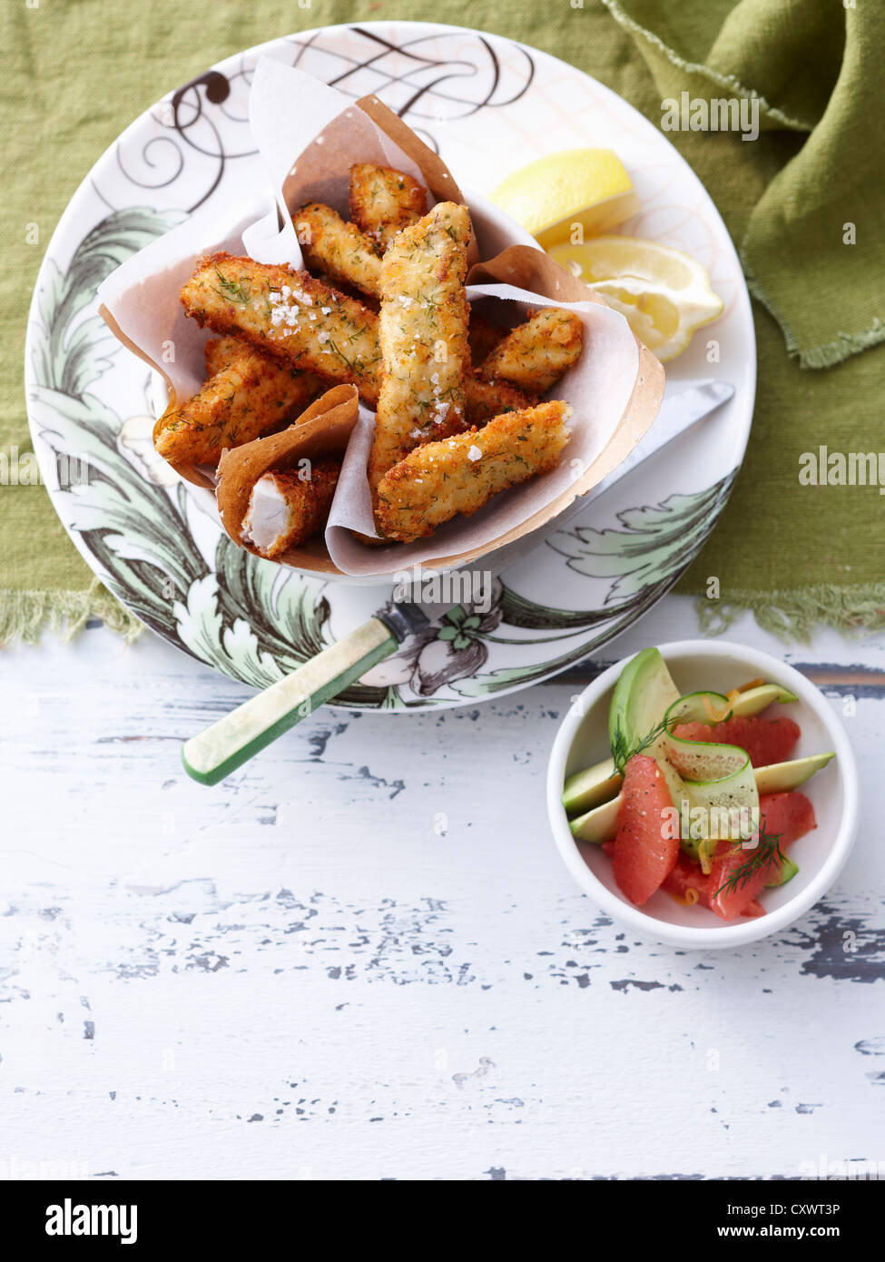 Plate of fried fish and lemon Stock Photo - Alamy