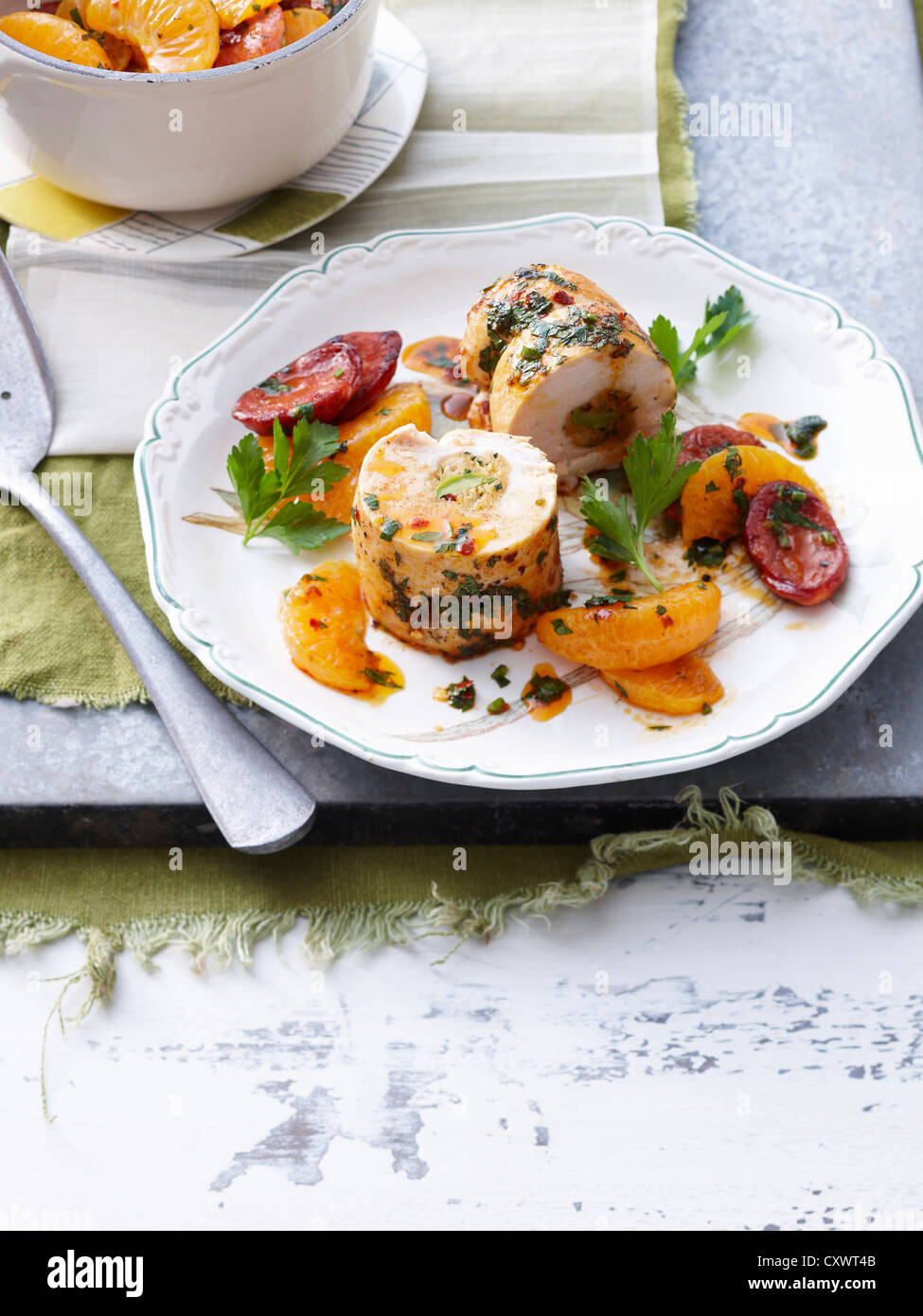 Plate of stuffed chicken and vegetables Stock Photo - Alamy