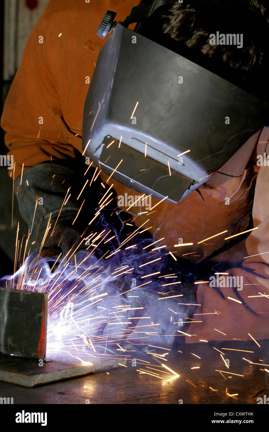 A welder pictured in a factory in Coventry Warwickshire England UK ...