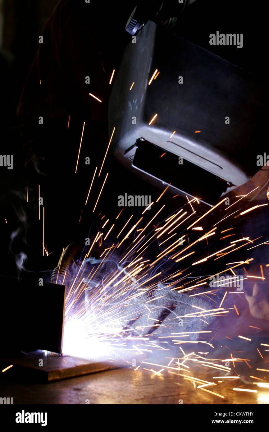 A welder pictured in a factory in Coventry Warwickshire England UK ...