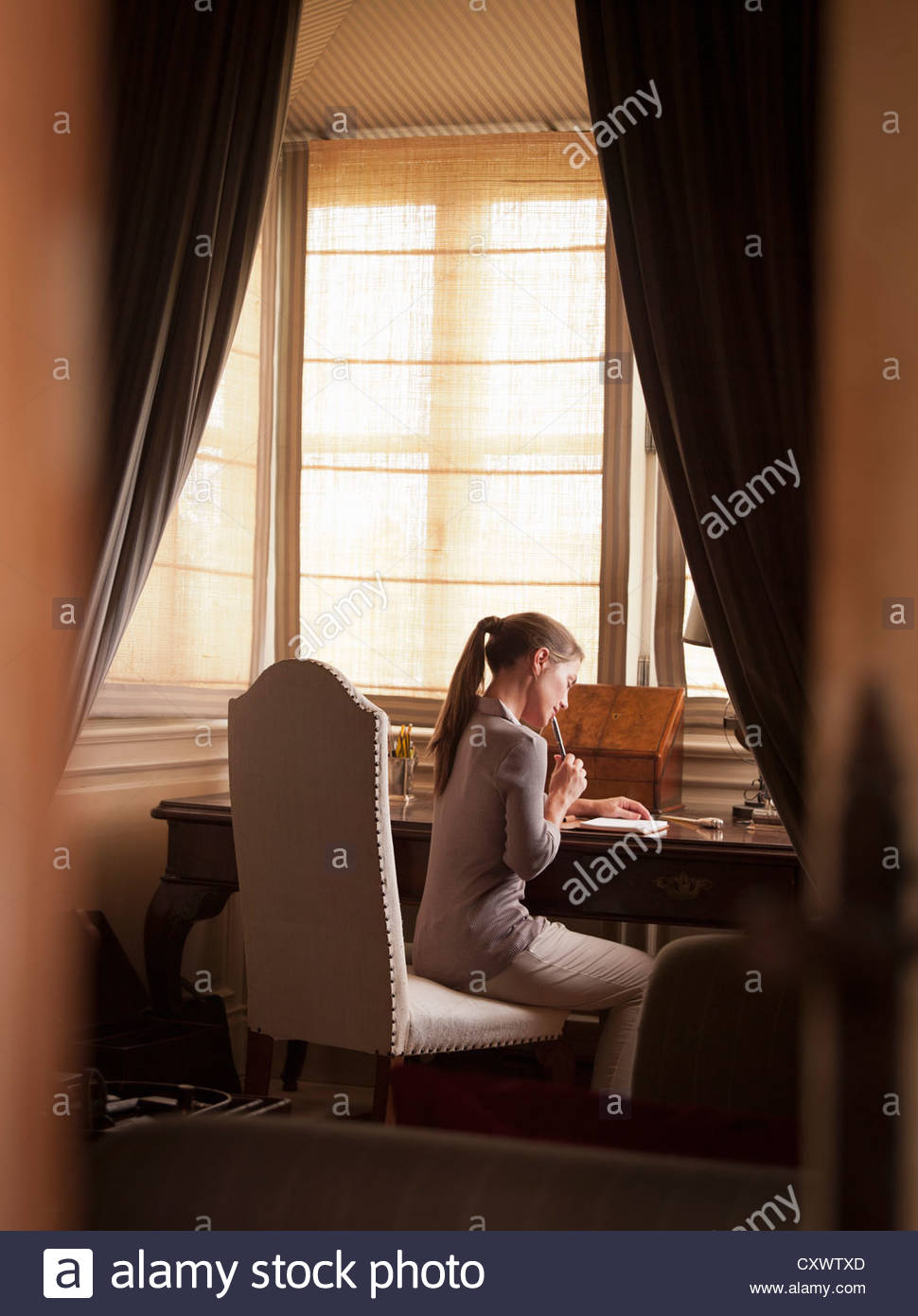 Woman Writing List Colour High Resolution Stock Photography and Images ...