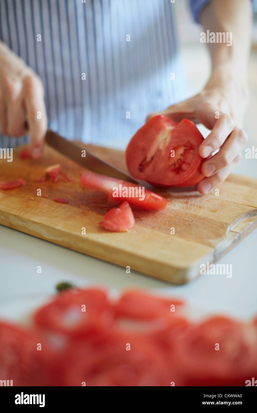 Close up man slicing tomato hi-res stock photography and images - Alamy