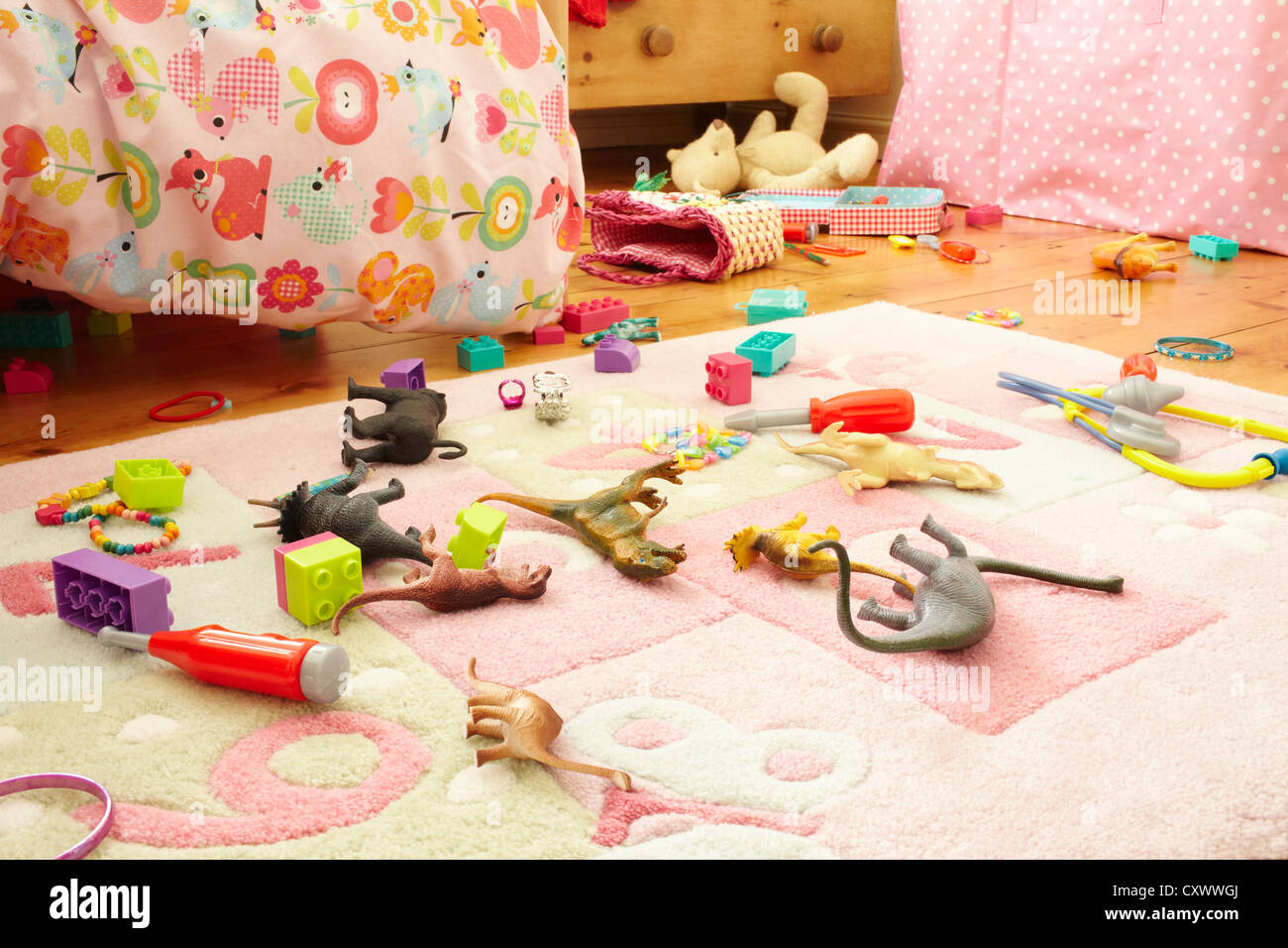 toys on floor of childs bedroom Stock Photo - Alamy