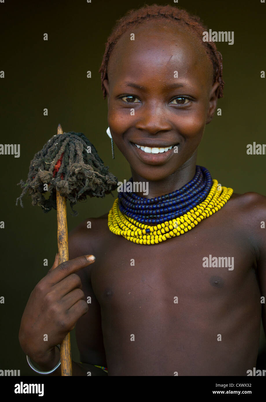 Dassanech Tribe Girl With Her Doll, Omorate, Omo Valley, Ethiopia Stock ...