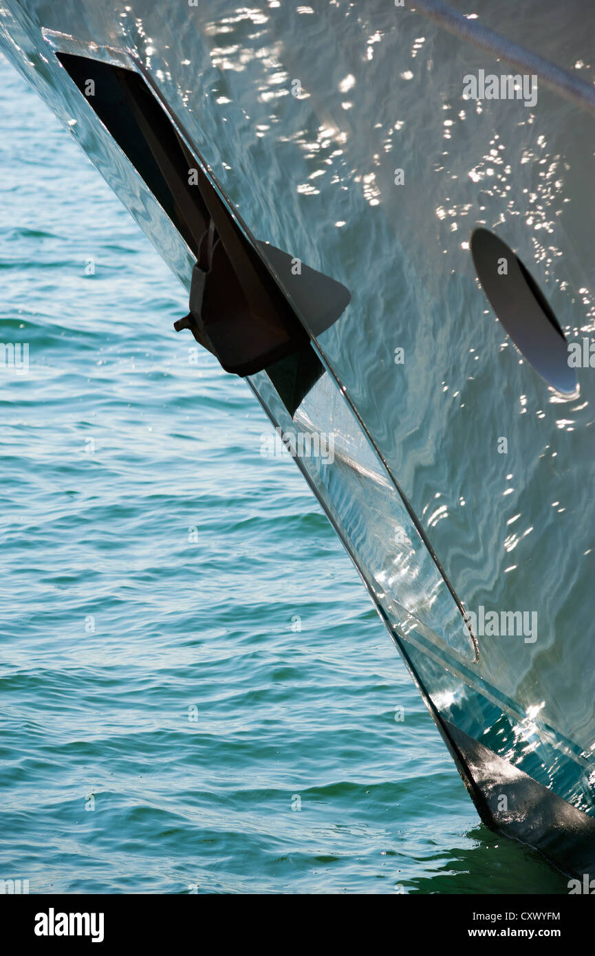 Patches of light, reflected from water surface, on boat side Stock ...