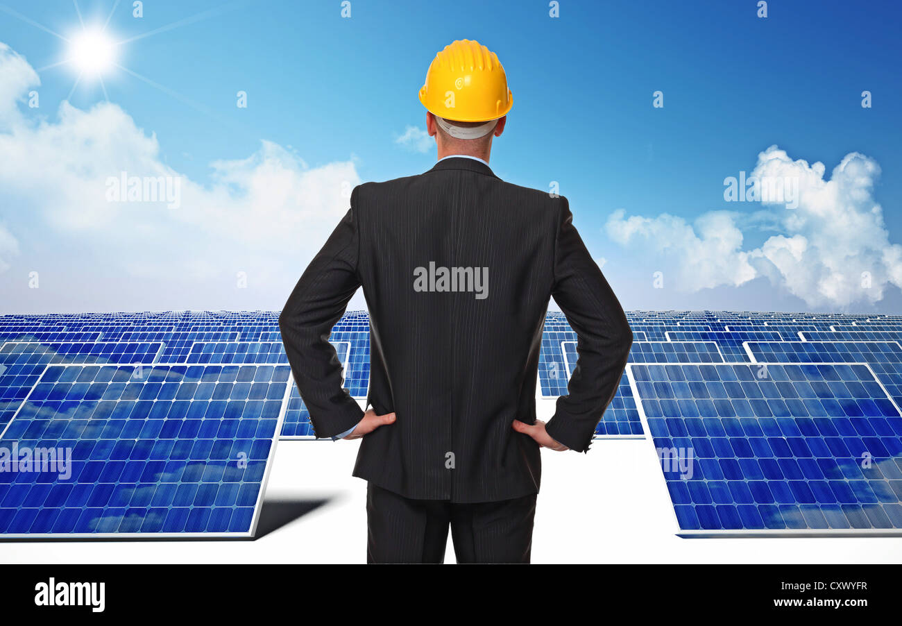 man and 3d solar panel background Stock Photo - Alamy