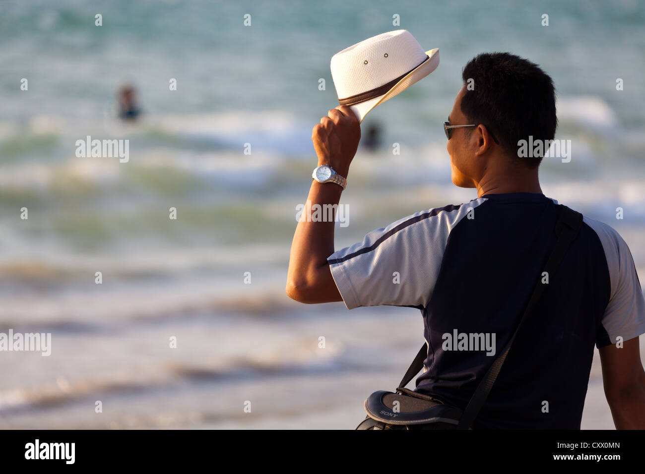 Tourist watching the Sunset on Phuket Island, Thailand Stock Photo - Alamy