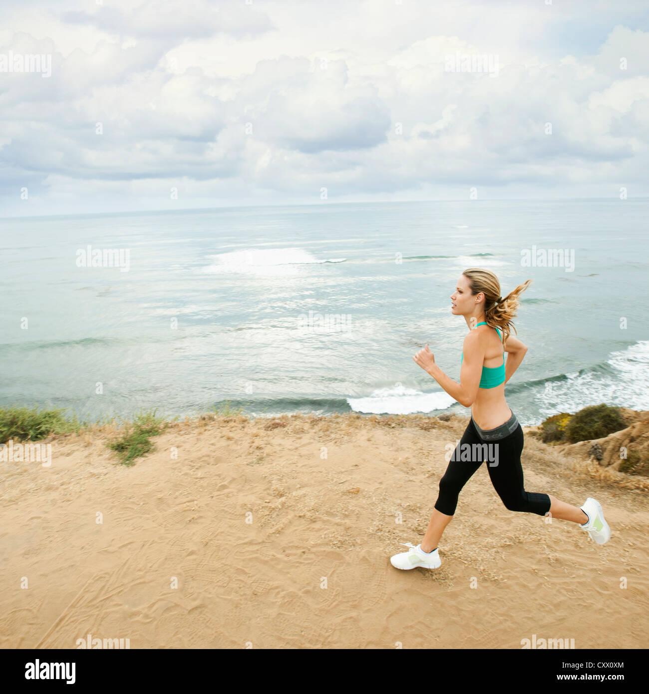 Woman Running On Beach at William Wickens blog