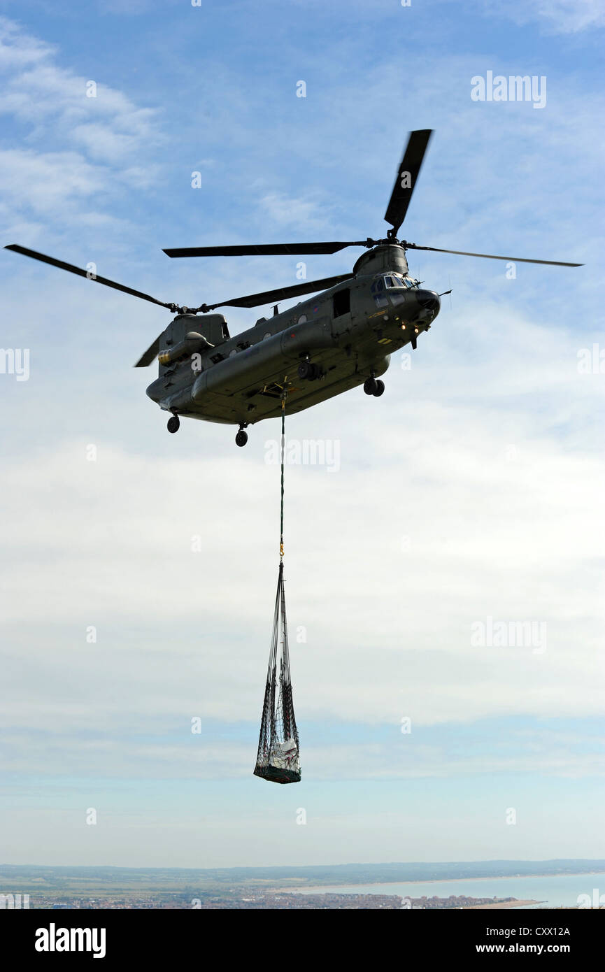 A Chinook Helicopter flies in the six tonne granite Bomber Command ...