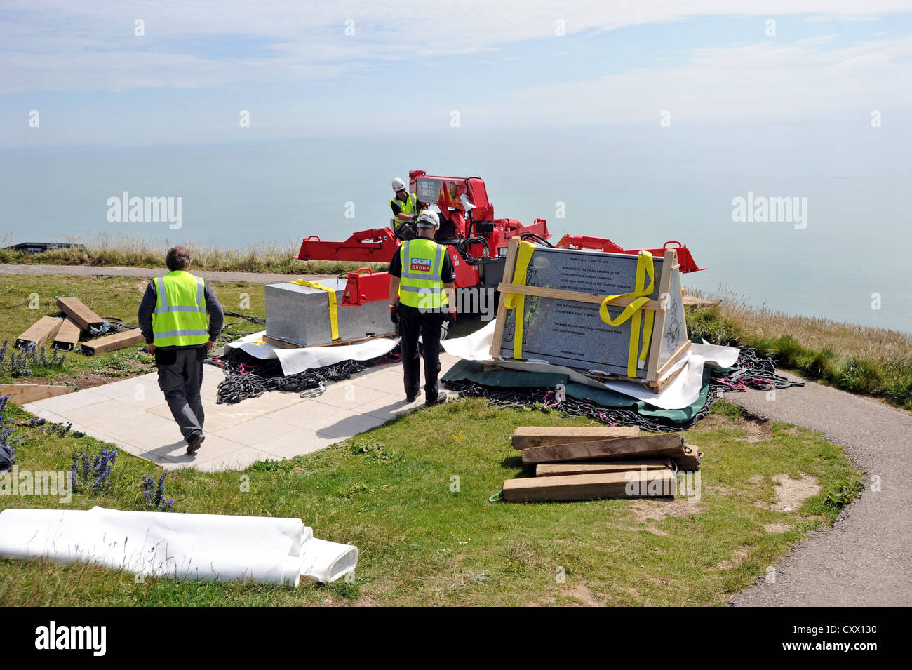 Workmen put in the place the six tonne granite Bomber Command memorial ...