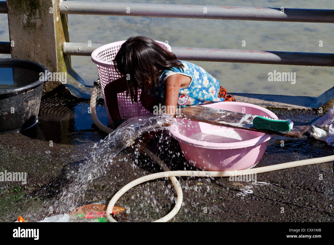 Little Sea Gypsy Children doing the Laundry at Rawai Beach in Phuket ...