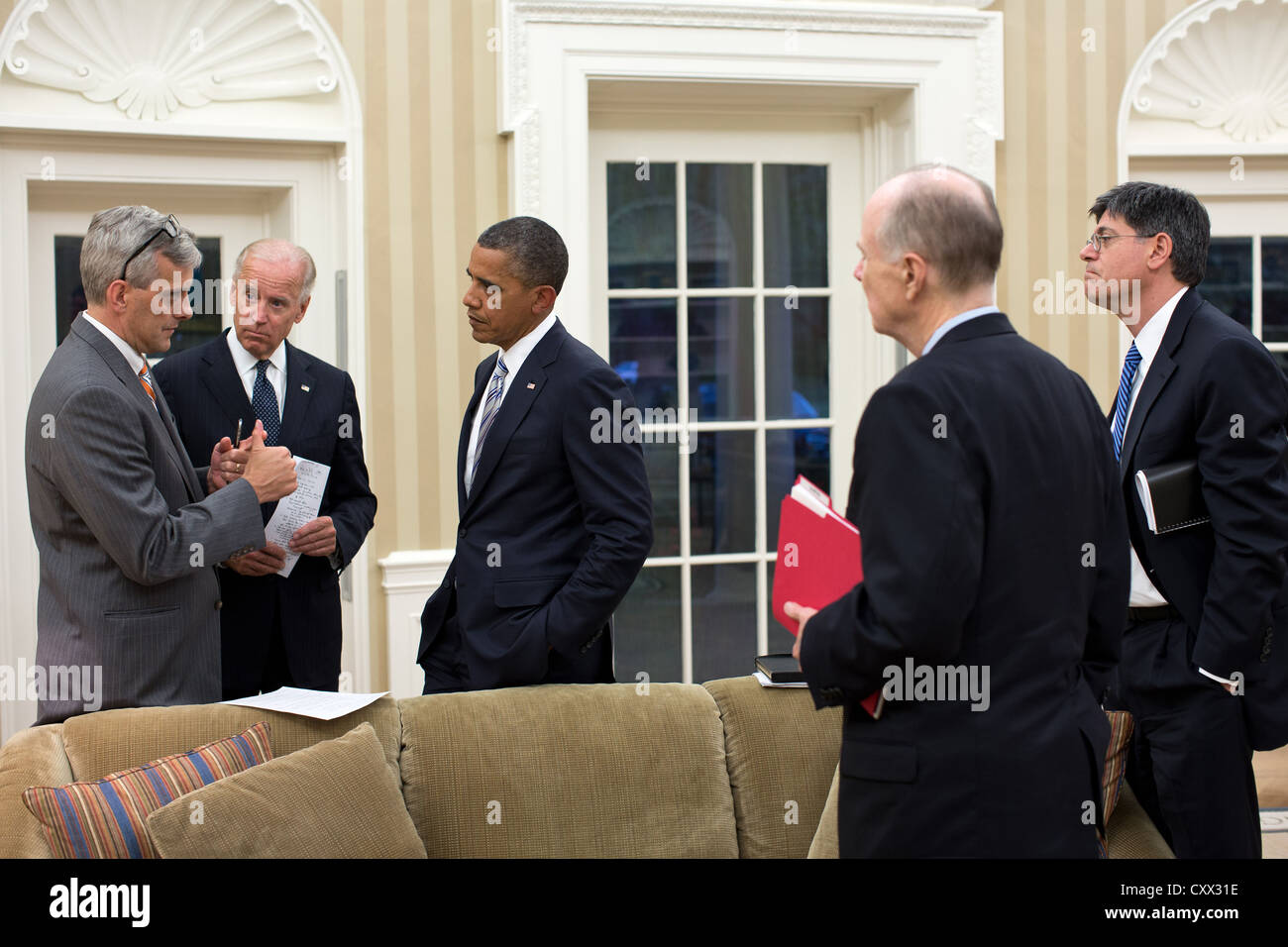 US President Barack Obama and Vice President Joe Biden talk with senior ...