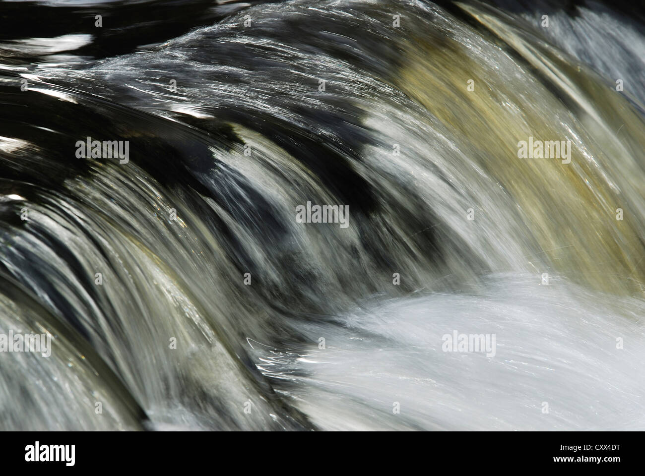 River water rushing over rocks Stock Photo - Alamy